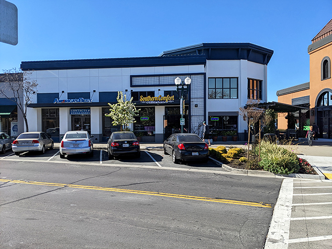 The unassuming exterior of Southern Comfort Kitchen hides culinary treasures within, like finding a jazz club in a phone booth.