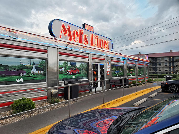 Step into a time machine disguised as a diner! Mel's gleaming exterior promises a journey back to the days when milkshakes ruled and jukeboxes rocked.