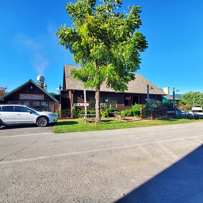 The rustic log cabin exterior of Trailhead Steak & Trout House promises what every great Tennessee meal should: honest food with no pretense, just pure deliciousness.