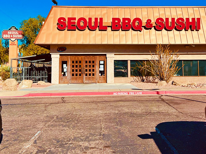 The bold red letters of Seoul BBQ & Sushi against the desert sky is like finding an oasis of flavor in Phoenix's beige landscape.