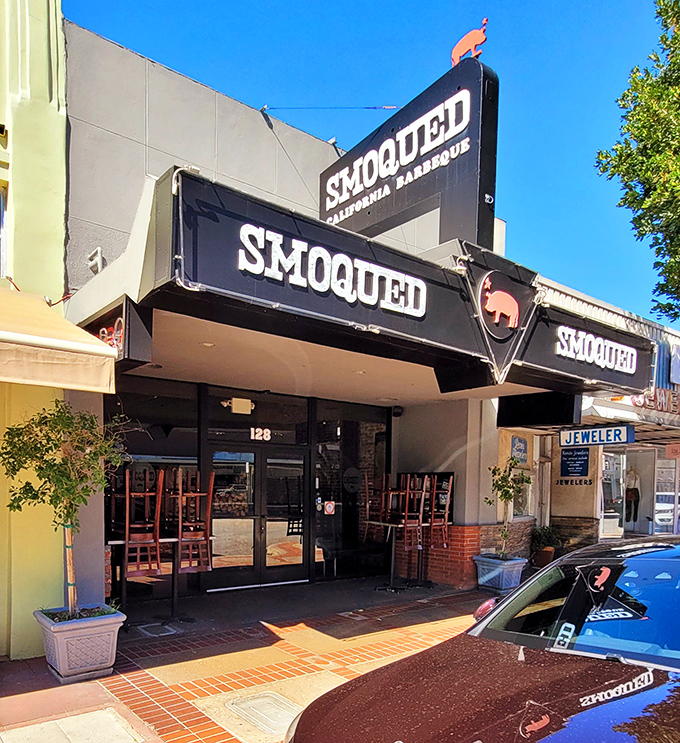 The pink pig silhouette perched atop Smoqued's sign isn't just cute &ndash; it's a beacon of hope for BBQ lovers wandering the California desert of mediocre meat.