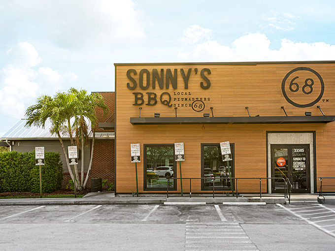 Sonny's wooden fa&ccedil;ade stands like a beacon of barbecue promise, the "68" emblem reminding us some traditions are worth preserving.