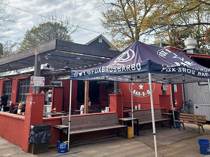 The unassuming red exterior of Fox Bros Bar-B-Q hides culinary greatness like Clark Kent's glasses hide Superman.