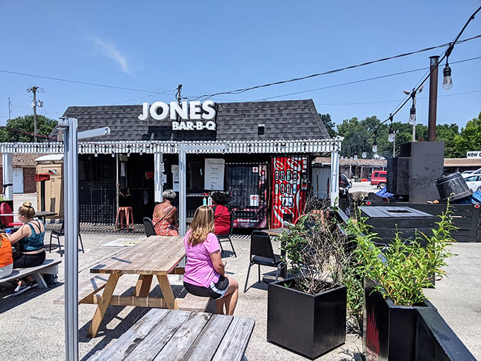 The unassuming black exterior of Jones Bar-B-Q speaks volumes: great barbecue doesn't need fancy digs, just smoke, skill, and soul.