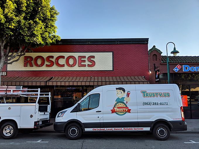 The red brick exterior of Roscoe's isn't just a building&mdash;it's a beacon for sandwich lovers. Those patio umbrellas promise shade, but the real protection you'll need is for your shirt.