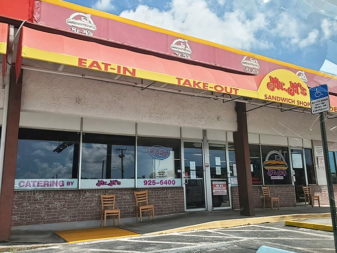 The red and yellow awning of Mr. M's beckons like a sandwich lighthouse in a sea of strip mall mediocrity. Simplicity never looked so inviting.