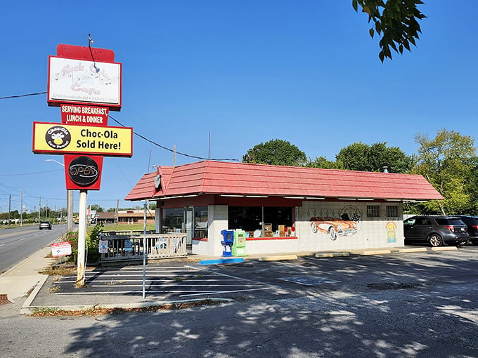 The iconic red roof of Rock-Cola 50's Cafe stands as a beacon of nostalgia along Indianapolis streets. Even the vintage sign promises good times ahead.