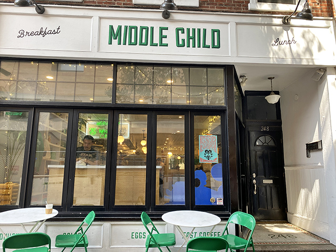 Middle Child's crisp white storefront with vibrant green signage stands like a beacon for sandwich pilgrims on Philadelphia's 11th Street. 