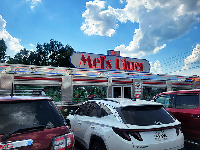 Step into a time machine disguised as a diner! Mel's gleaming exterior promises a journey back to the days when milkshakes ruled and jukeboxes rocked.