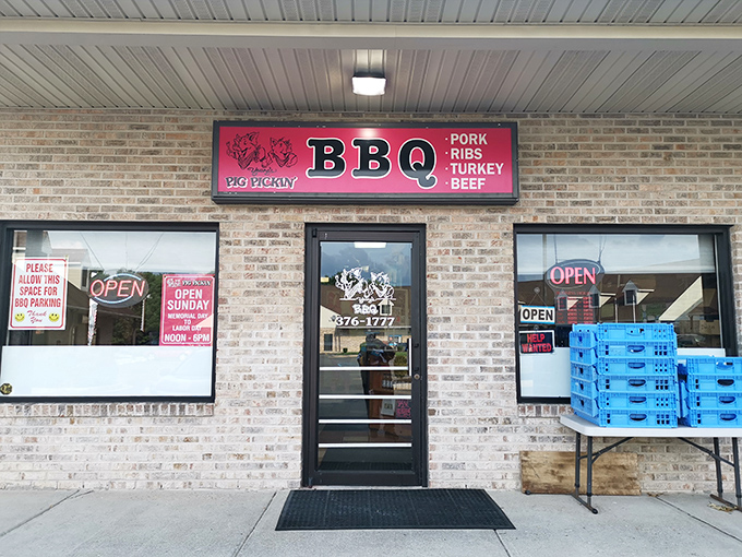 The pink sign beckons like a smoky siren call. Young's BBQ's unassuming brick exterior promises no frills&mdash;just exceptional barbecue waiting inside.