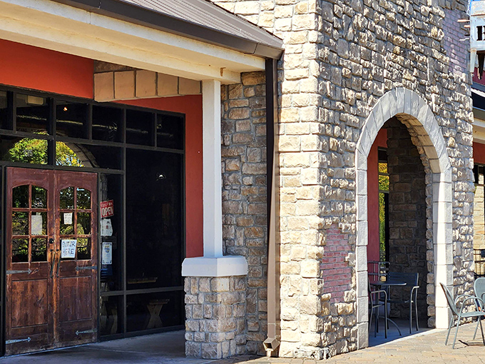The wooden facade of barbecue paradise beckons with its bold red sign &ndash; a siren call to meat lovers that promises smoky delights within.
