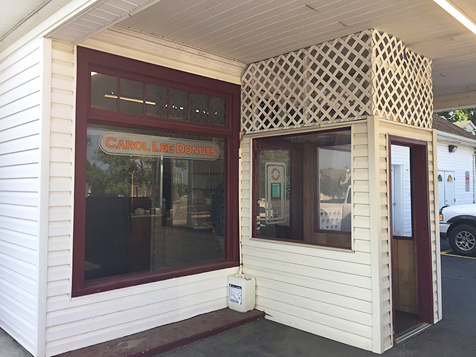 The iconic orange sign beckons like a sunrise, promising sweet salvation to early risers and donut devotees alike. A Blacksburg landmark that's worth every calorie.