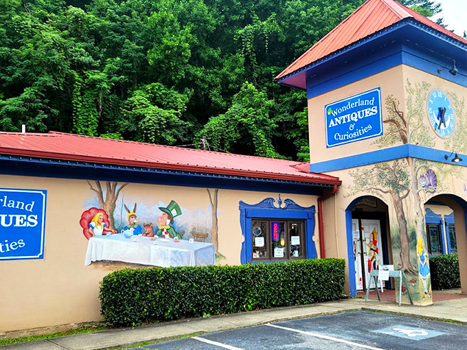 The blue clock tower of Wonderland Antiques stands like a storybook portal in Helen, complete with Alice-themed murals inviting curious souls to tumble down the rabbit hole.