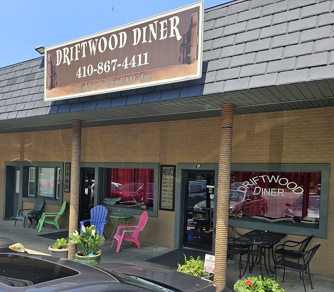 Welcome to flavor town! The Driftwood Diner's unassuming exterior hides a world of culinary delights waiting to be discovered. It's like finding a treasure chest disguised as a shoebox.