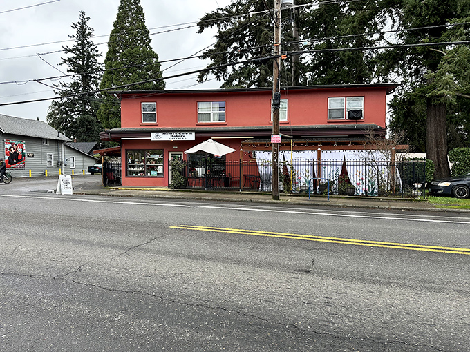 Welcome to flavor town! Mehri's Cafe & Bakery's cherry-red exterior is like a beacon for hungry souls in Portland.