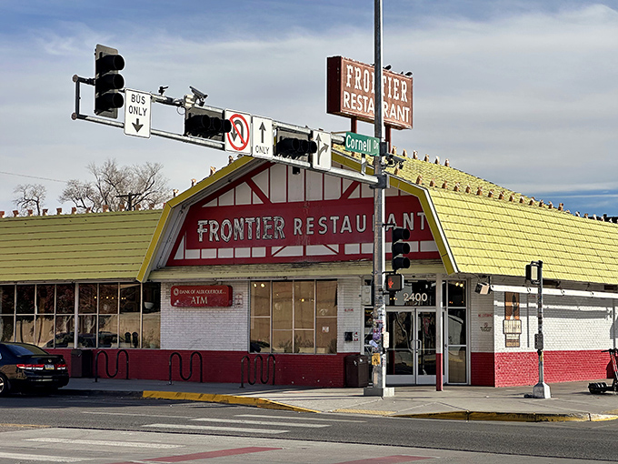 The iconic yellow and red A-frame beckons from Central Avenue like a culinary lighthouse, promising New Mexican treasures inside.
