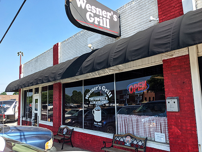 The red and white exterior of Wesner's Grill stands like a beacon of breakfast hope on Chestnut Street. No fancy frills, just honest food awaiting inside.