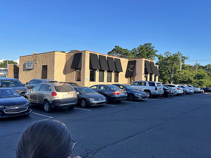 The unassuming exterior of Landmark Diner stands as Charlotte's culinary fortress &ndash; modest architecture hiding extraordinary flavors within. 