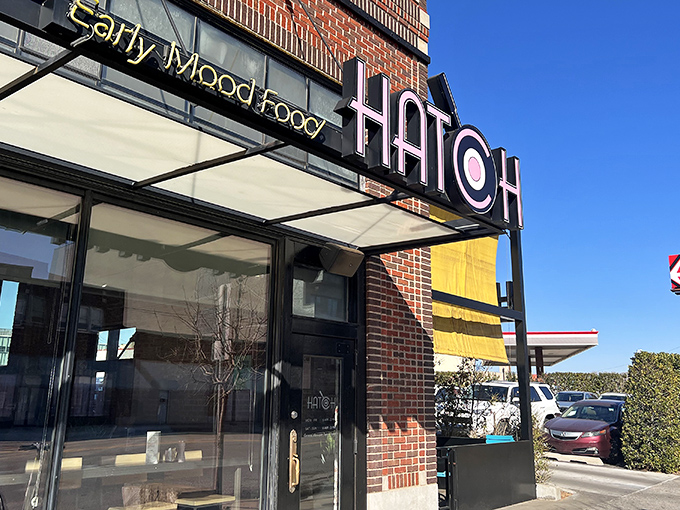 The sunny yellow exterior of Hatch announces its presence like a breakfast beacon, complete with that iconic egg-in-the-O logo.
