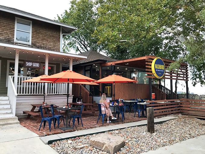 NASHBIRD's charming converted house exterior beckons with its wooden deck and bright signage&mdash;like a Southern porch that happens to serve life-changing chicken.