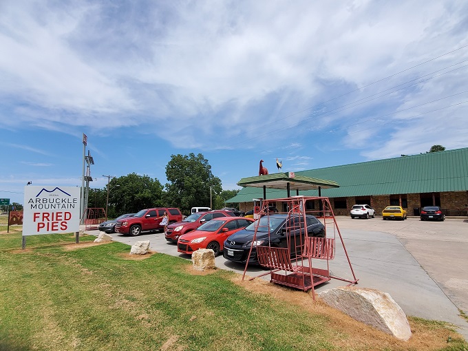 The humble exterior belies the culinary treasures within. Under Oklahoma's big sky, this unassuming building houses pie perfection that's worth every mile of the journey.