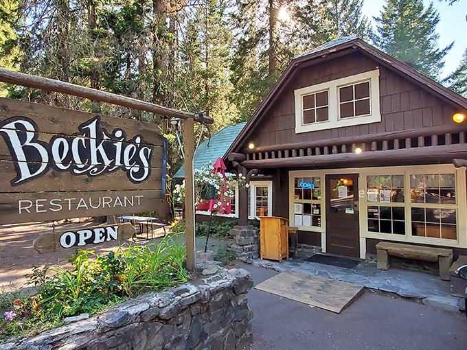 Nestled among towering pines, Beckie's rustic cabin exterior promises woodland charm and homestyle comfort before you even step inside. 