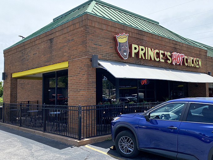 The iconic crowned logo of Prince's Hot Chicken stands like a fiery beacon on Nashville's landscape, promising delicious pain to brave souls.