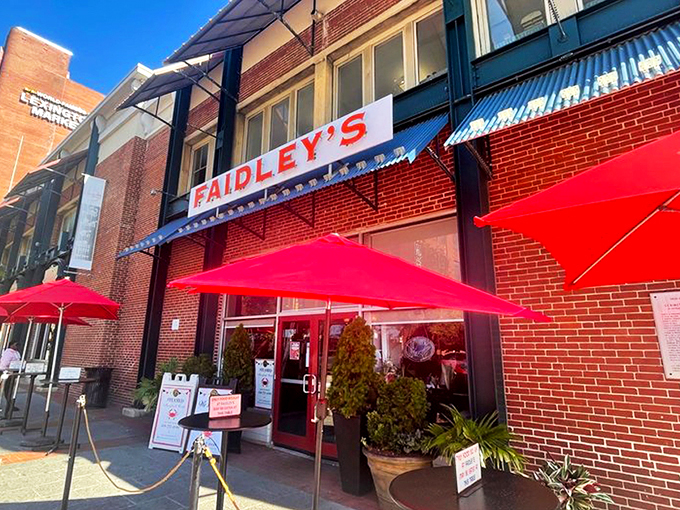 The brick facade of Faidley's stands like a seafood shrine in Baltimore, its vintage sign promising treasures from the Chesapeake that have delighted generations.