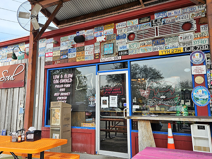 The converted gas station sanctuary where smoke signals beckon hungry pilgrims from miles around. Georgia's coastal barbecue haven awaits beneath that humble wooden awning.