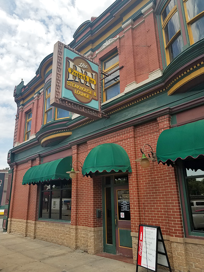 The brick facade and vintage sign of Frederick Inn stand as a culinary landmark in St. Joseph, where time slows down and appetites grow.