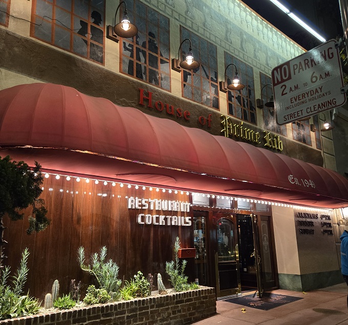 The iconic red awning beckons meat lovers like a carnivorous lighthouse on Van Ness Avenue, promising beef-filled dreams since 1949.