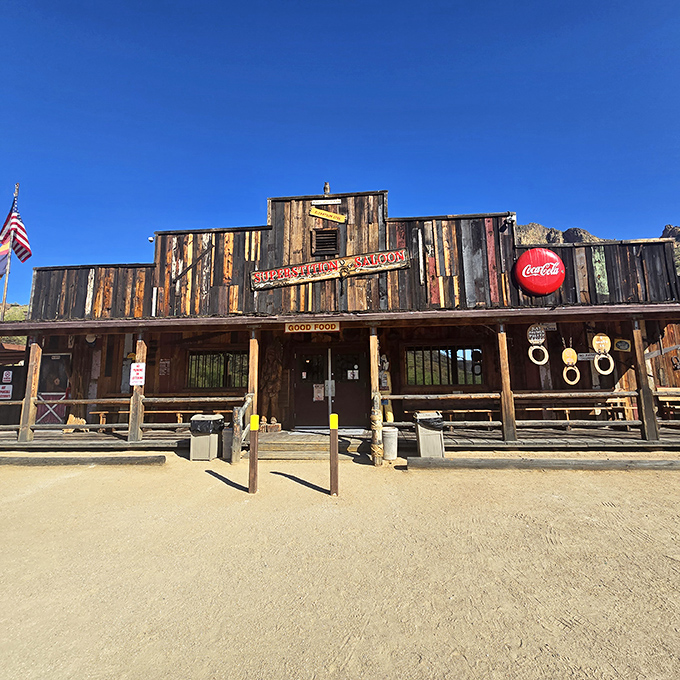 The weathered wooden facade of Tortilla Flat Saloon stands defiantly against time, a slice of the Wild West complete with authentic frontier charm and a Coca-Cola sign that's seen it all.