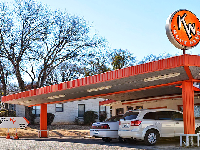 The unassuming exterior of K N Root Beer Drive In proves once again that Texas's greatest culinary treasures often hide in plain sight.