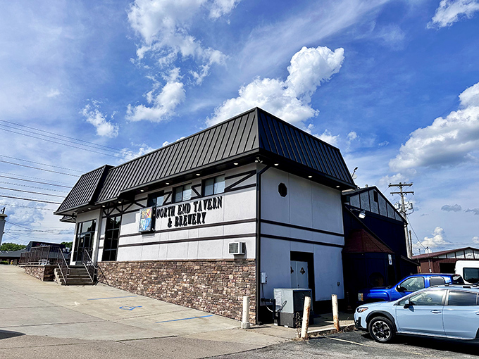 The Tudor-style exterior of North End Tavern & Brewery stands as a welcoming beacon for hungry travelers and thirsty locals alike.