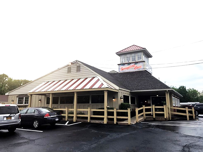 The lighthouse-inspired cupola atop Smuggler's Cove beckons seafood lovers like a maritime beacon, guiding hungry travelers to this Pocono Mountains treasure. 