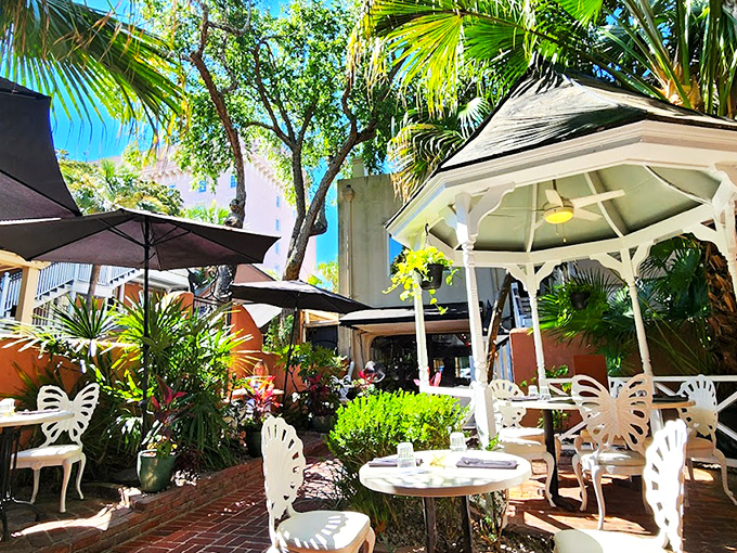 The courtyard at 82 Queen feels like Charleston's best-kept secret&mdash;a lush oasis where palm fronds and wrought-iron chairs conspire to make time slow down deliciously.