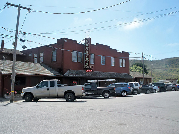 The iconic rose-colored exterior of Duarte's Tavern stands like a culinary lighthouse on Pescadero's main drag, beckoning hungry travelers since 1894.
