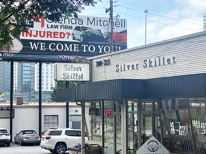 The unassuming storefront of The Silver Skillet stands like a time capsule on Atlanta's 14th Street, promising authentic Southern comfort without an ounce of pretension.