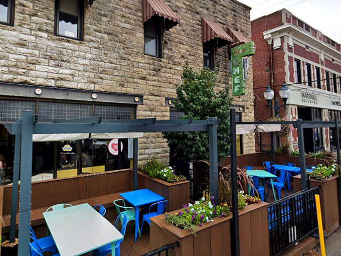 The limestone facade of The Chef welcomes hungry patrons with its cheerful egg-shaped "Open" sign&mdash;a promise of good things to come inside.