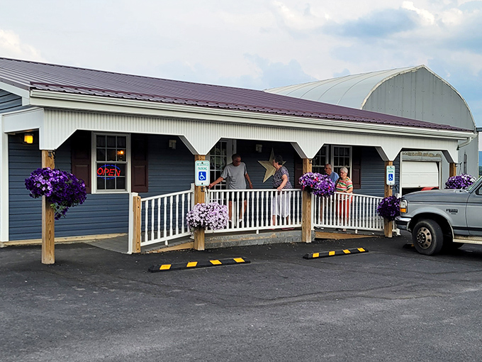 The unassuming exterior of Earlystown Diner belies the culinary treasures within. Those hanging purple petunias aren't just for show&mdash;they're your first clue that someone here cares about details.
