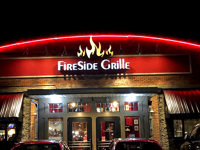 The fiery red glow of FireSide Grille's sign cuts through the night like a beacon for hungry souls wandering Hurricane's streets.