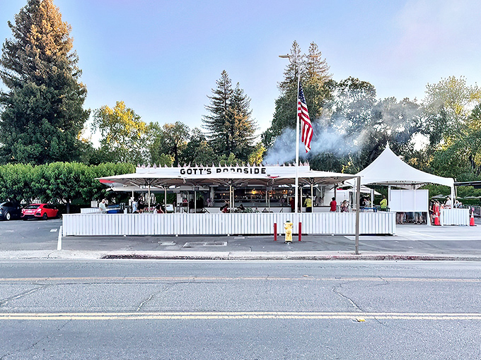 The iconic white exterior of Gott's Roadside with its bold "EAT" sign&mdash;a siren call to hungry travelers that brooks no argument.