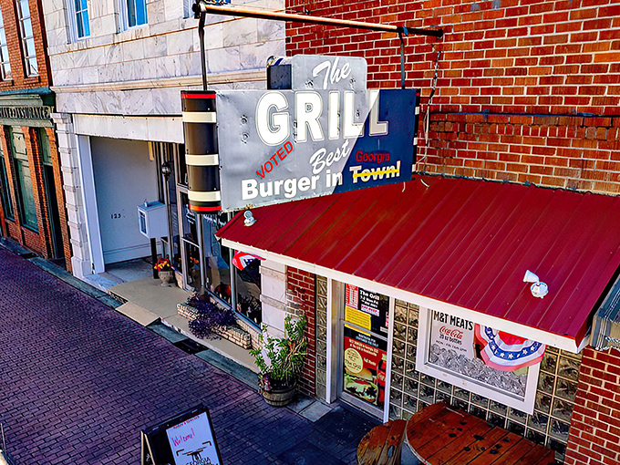 The sign doesn't lie&mdash;this unassuming brick storefront houses burger magic that's drawn pilgrims from across Georgia for good reason.