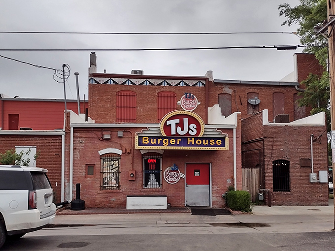 That iconic yellow and red sign against classic brick isn't just restaurant signage&mdash;it's a beacon of burger hope for hungry Kansans everywhere.