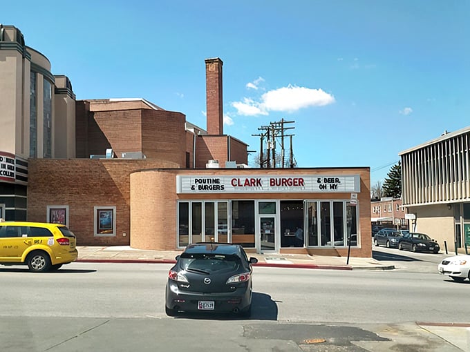 The bold red letters against the brick facade aren't just signage &ndash; they're a beacon calling to burger lovers across Baltimore like a meaty lighthouse.