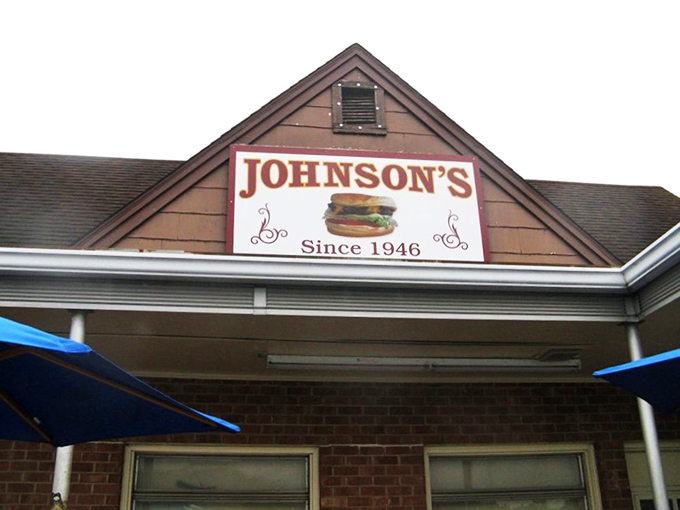 The unassuming exterior of Johnson's Drive-In has welcomed burger enthusiasts since 1946, proving that culinary landmarks don't need flashy facades to become legendary. 