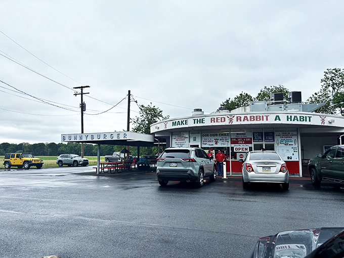 The nostalgic exterior of Red Rabbit Drive-In stands like a time capsule against Pennsylvania skies, complete with vintage kiddie rides that transport you straight back to simpler times. 