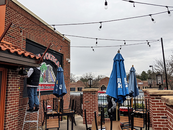 La Tolteca's sunny yellow exterior with terracotta roof stands like a beacon of culinary promise against Delaware's sky. No architectural awards here&mdash;just the promise of authentic flavors inside.