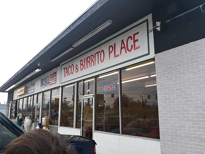 The architectural equivalent of "I'm here for the food, not the frills." Taco & Burrito Place announces its straightforward mission with no-nonsense signage.