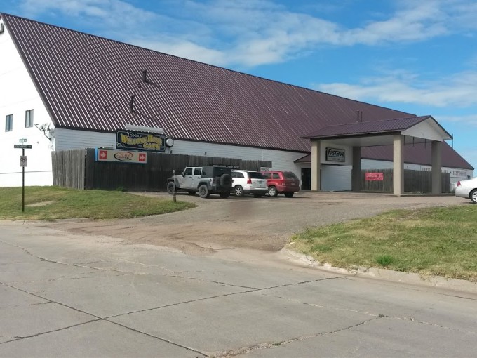 The unassuming exterior of Welcome Home Cafe in Colby might not scream "culinary destination," but that metal roof shelters some serious home cooking magic.